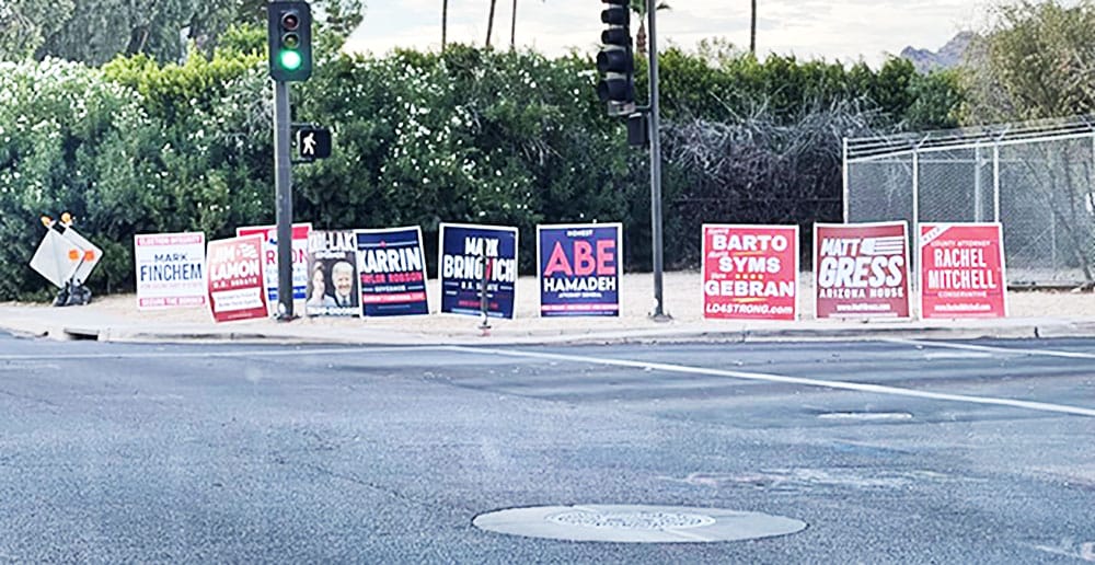 State senator pitches ban on political signs at street corners, medians ...